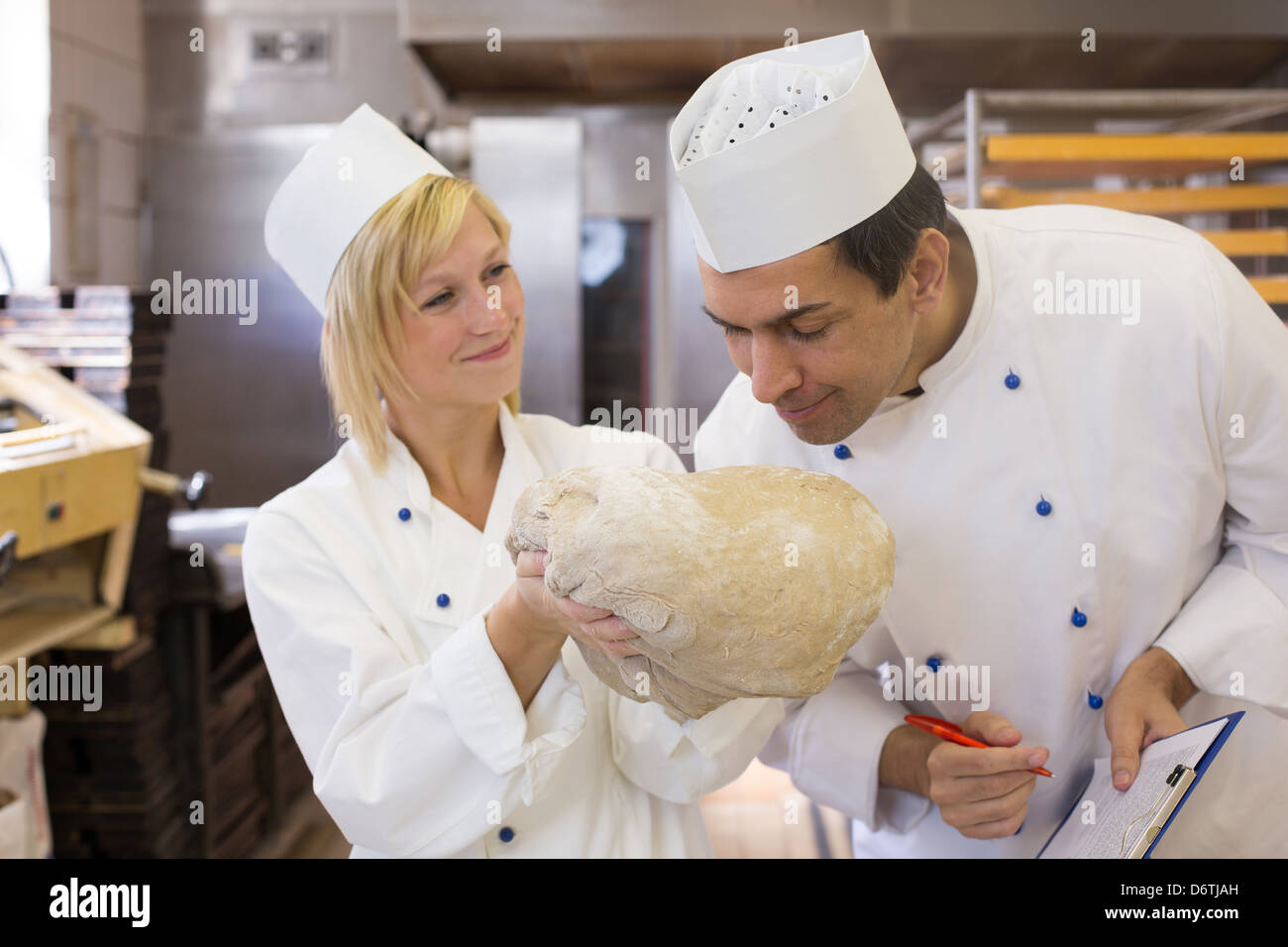 Woman kneading dough bread manufacturing hi-res stock photography and ...