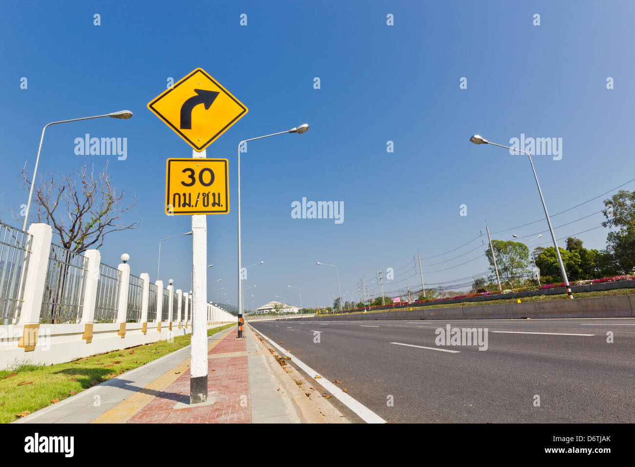 Distance Highway Road and Traffic Sign with Background of Blue Sky in a ...