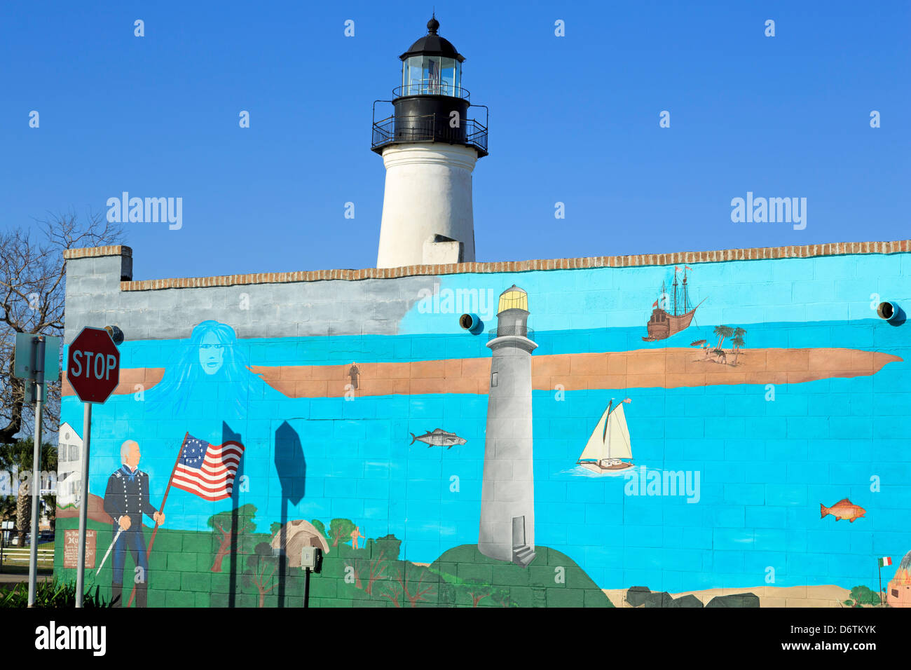 Mural on the wall with a lighthouse in the background, Point Isabel ...