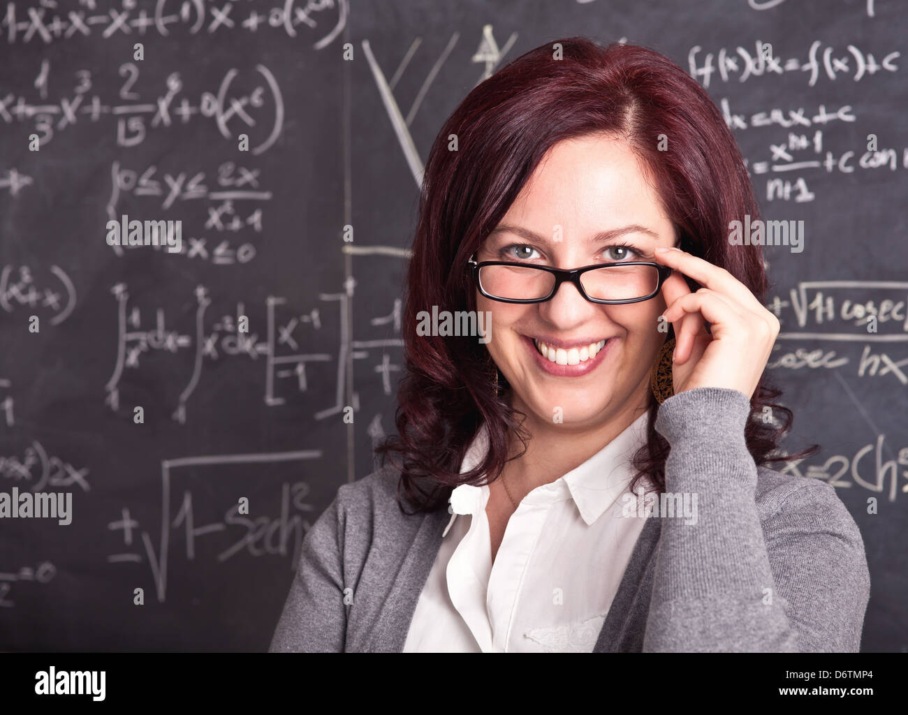 portrait of woman teacher and blackboard background Stock Photo - Alamy