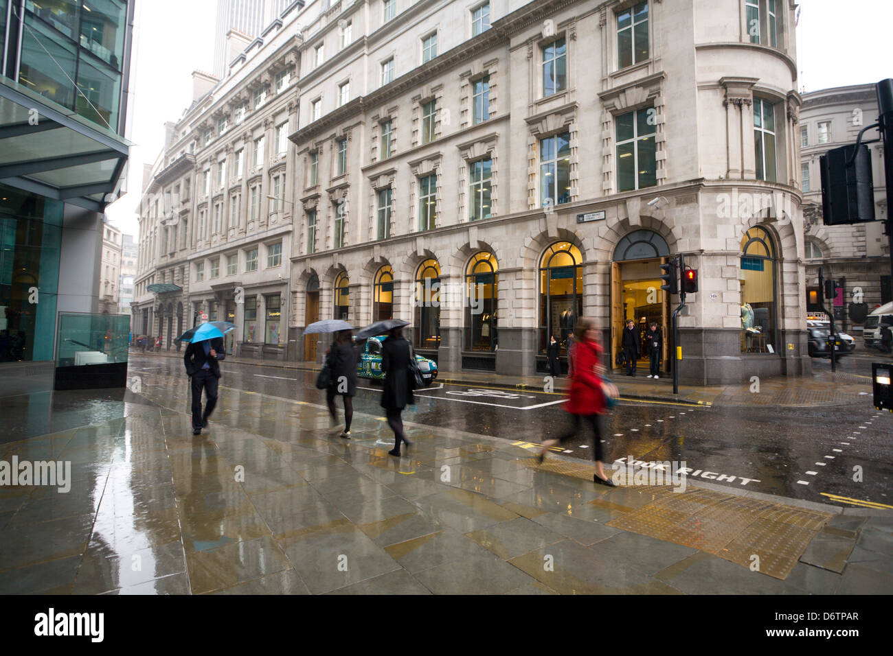 People running through the rain, Old Broad Street, London Stock Photo ...