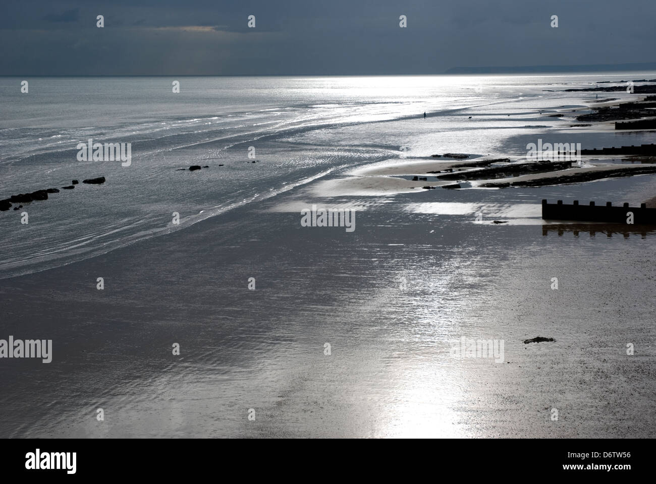 Sunshine on Hastings beach after a spring rain storm Stock Photo - Alamy