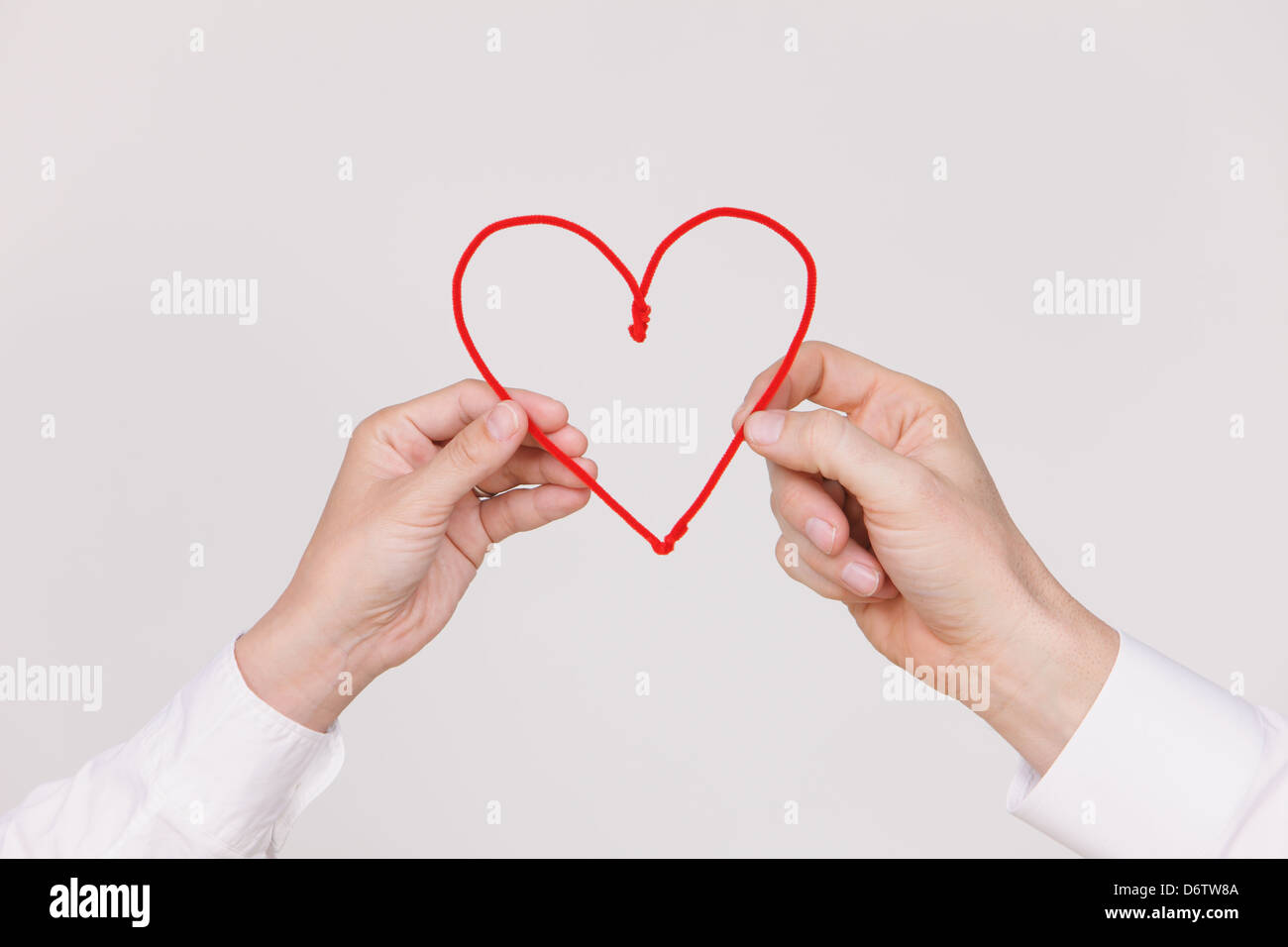 Hands and heart Stock Photo - Alamy