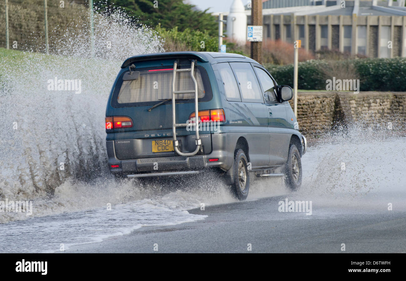 Car splashing puddle hi-res stock photography and images - Alamy