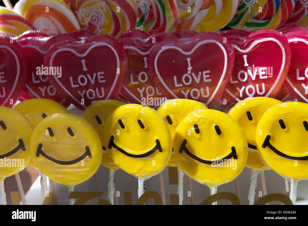 Seaside lollipops with 'I love you' and smiley faces Stock Photo - Alamy