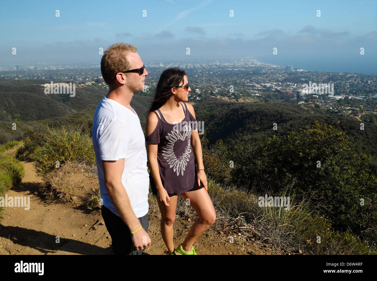 Couple hiking the Temescal Ridge Trail see the ocean Stock Photo - Alamy