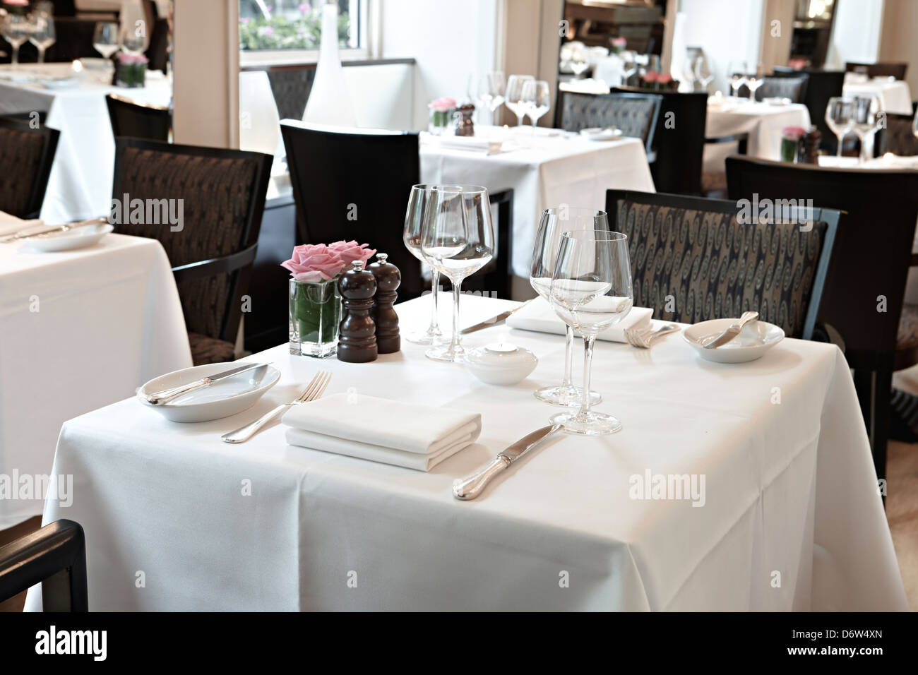 restaurant tables laid for service Stock Photo - Alamy