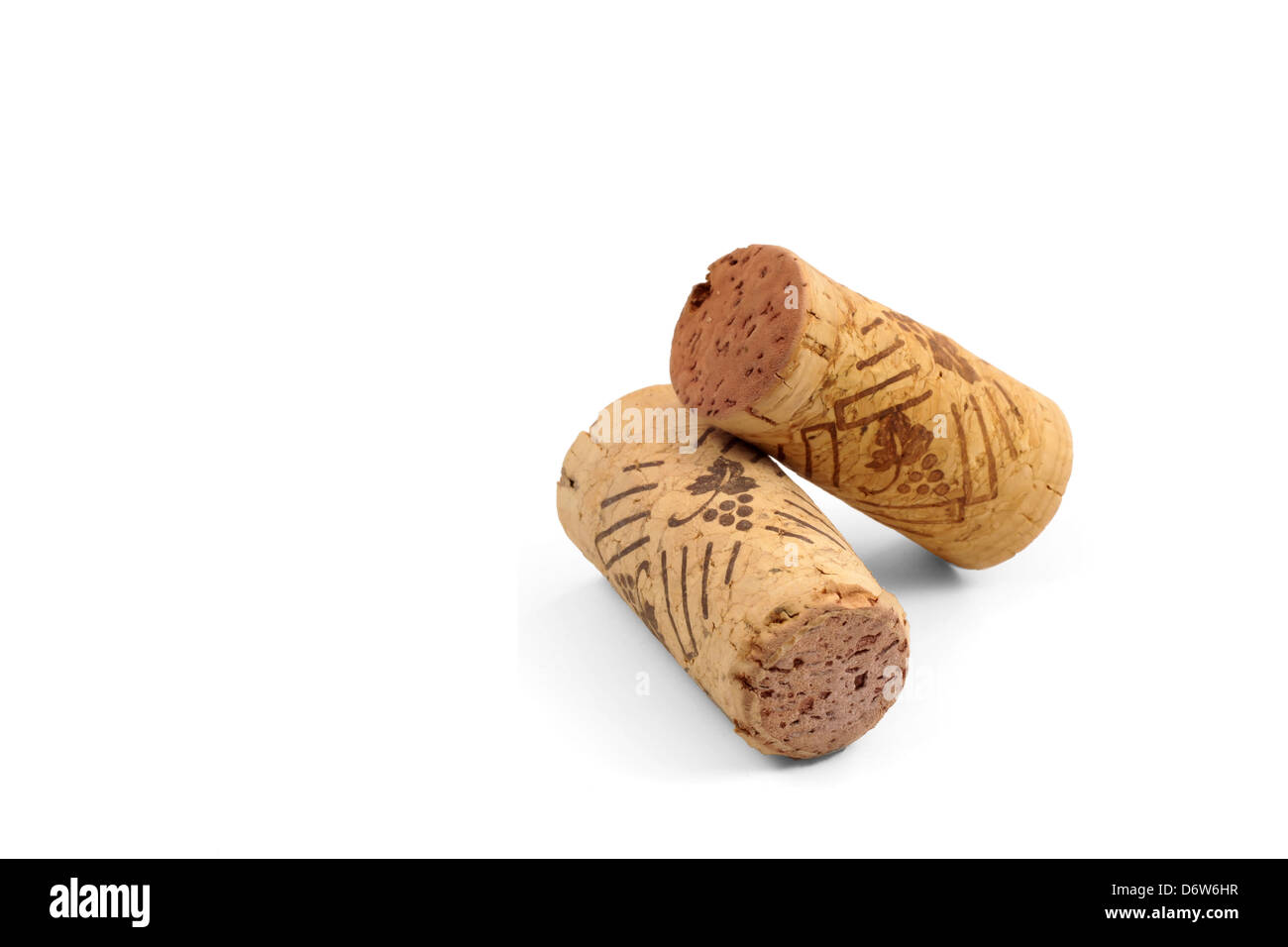 Two isolated corks with white background Stock Photo - Alamy