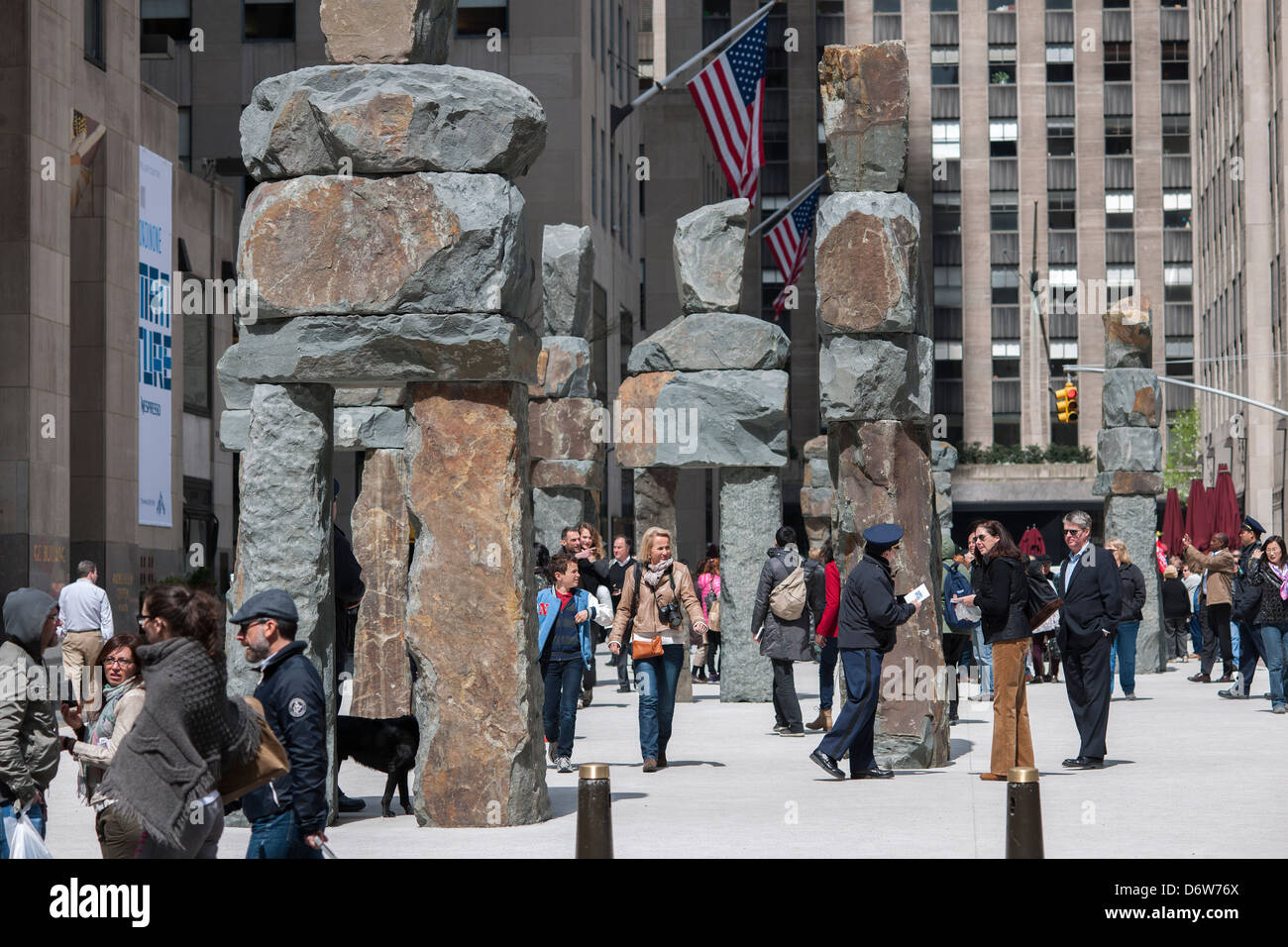 Visitors to Rockefeller Center walk amongst the "Human Nature ...