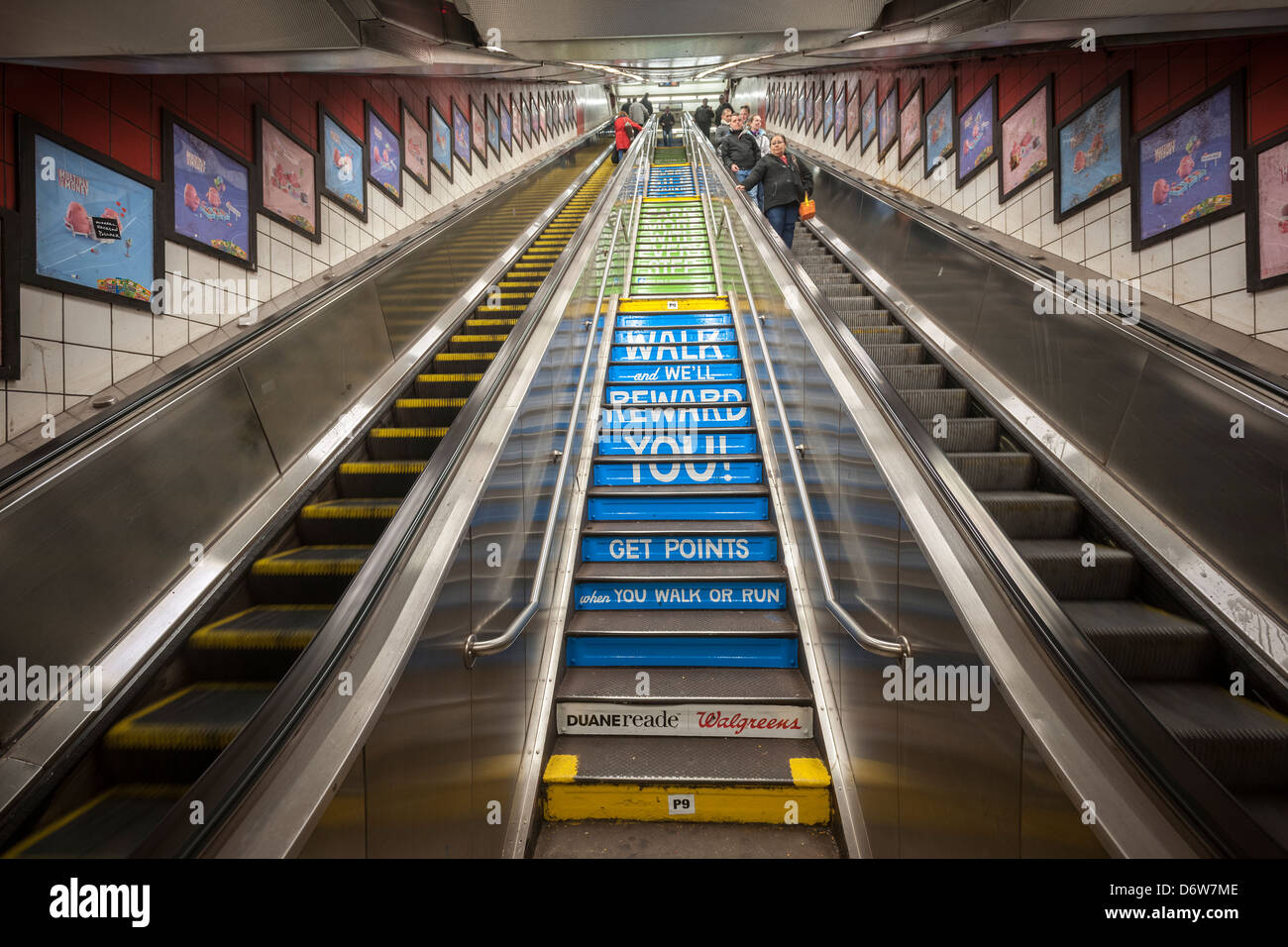 Stairs, surrounded by escalators show advertising for the Duane Reade ...