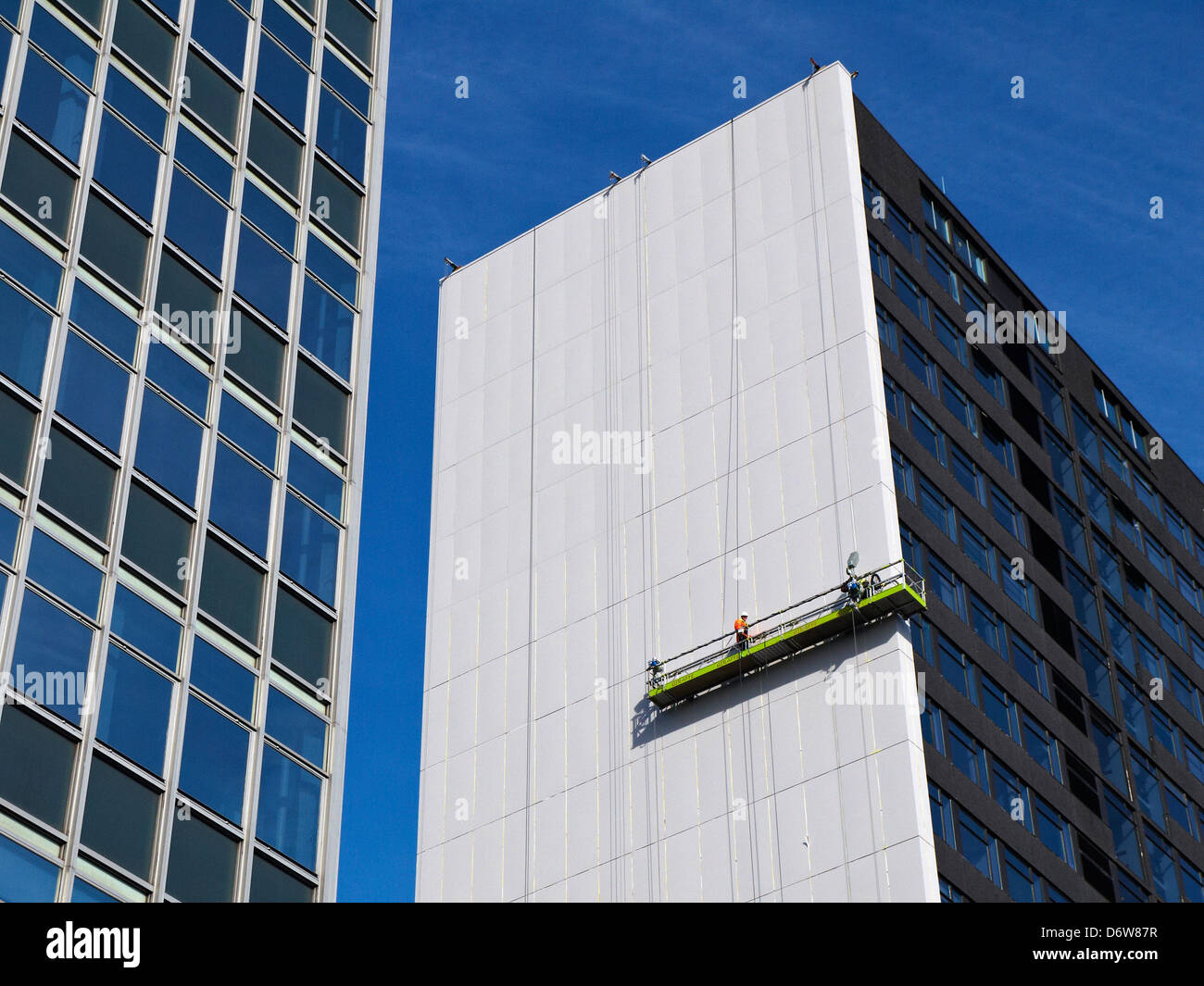 Replacing cladding on former Portland Tower, now Manchester One ...
