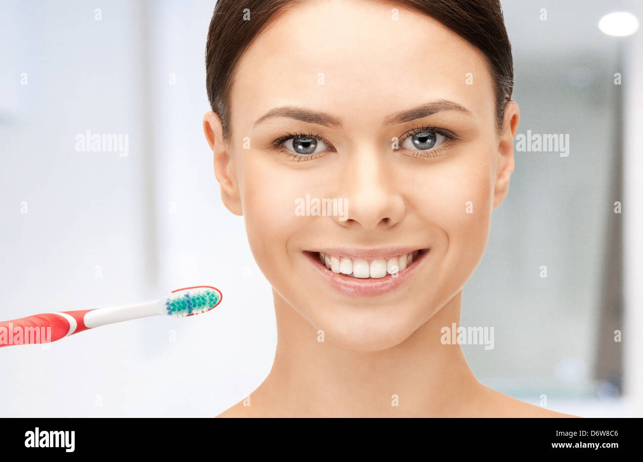 beautiful woman with toothbrush Stock Photo - Alamy