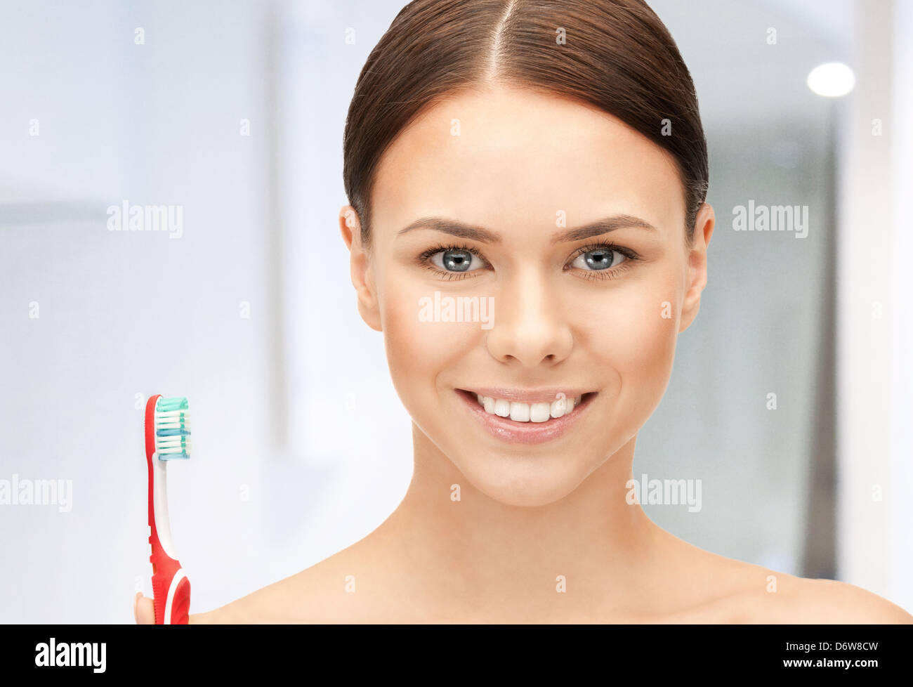 beautiful woman with toothbrush Stock Photo - Alamy