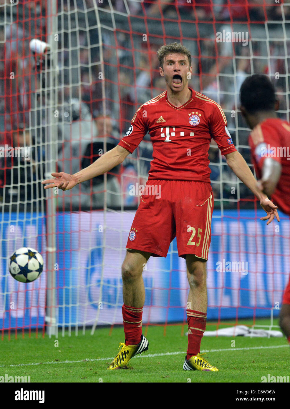 Munich's Thomas Mueller celebrates after scoring 4-0 during the UEFA ...