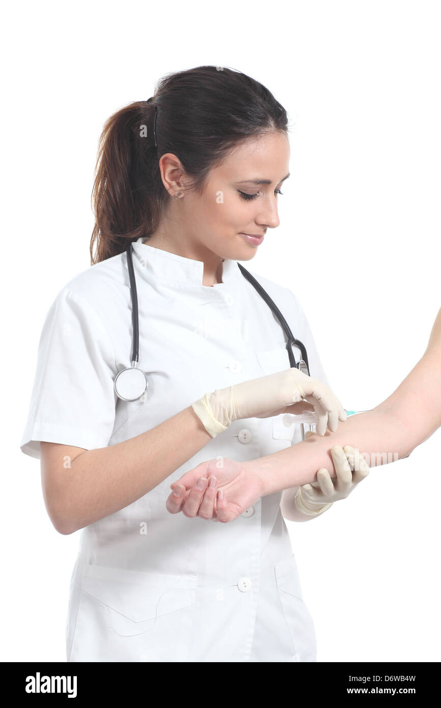 Beautiful nurse giving an injection isolated on a white background ...