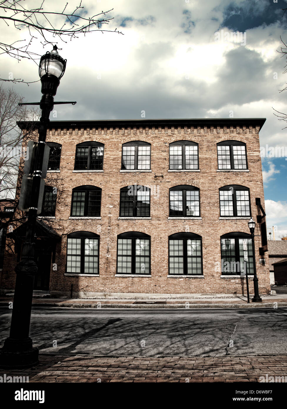 brick building and lamp post Stock Photo - Alamy