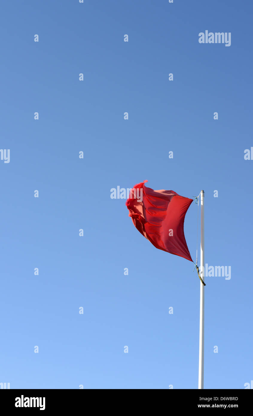 Red Flag signifying Danger Stock Photo - Alamy