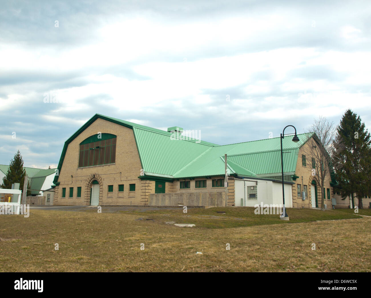 pretty barn with green aluminum roof Stock Photo - Alamy