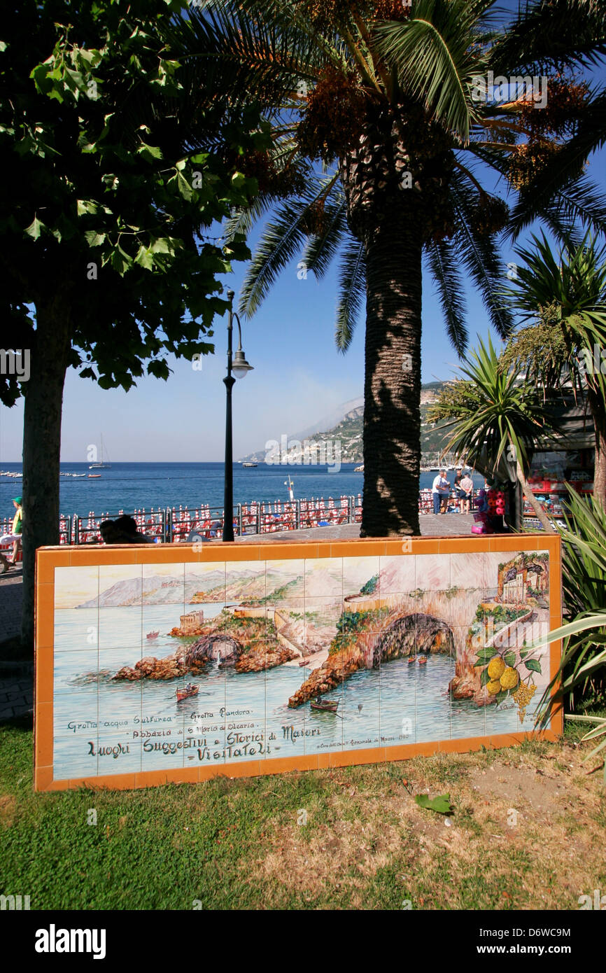 Italy, Neapolitan Riviera, Maiori, Palm trees and map of island region ...