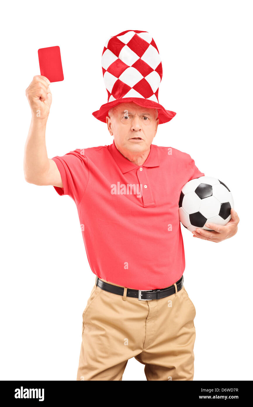 Angry mature football fan with ball giving a red card isolated on white ...