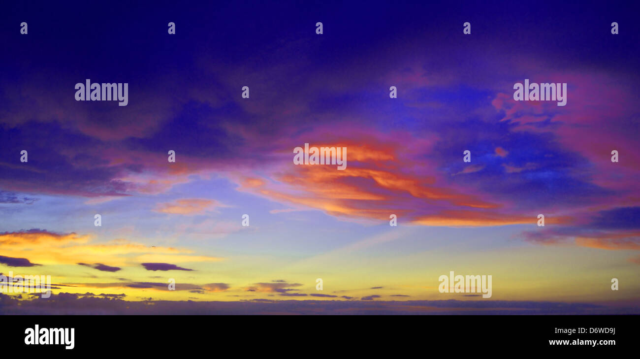 Colorful clouds at sunset Stock Photo - Alamy