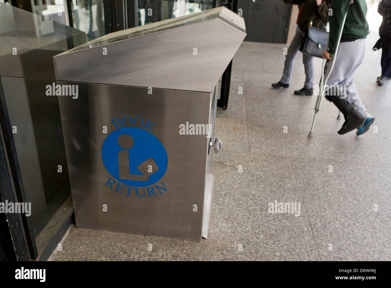 Public library book return drop box Stock Photo - Alamy