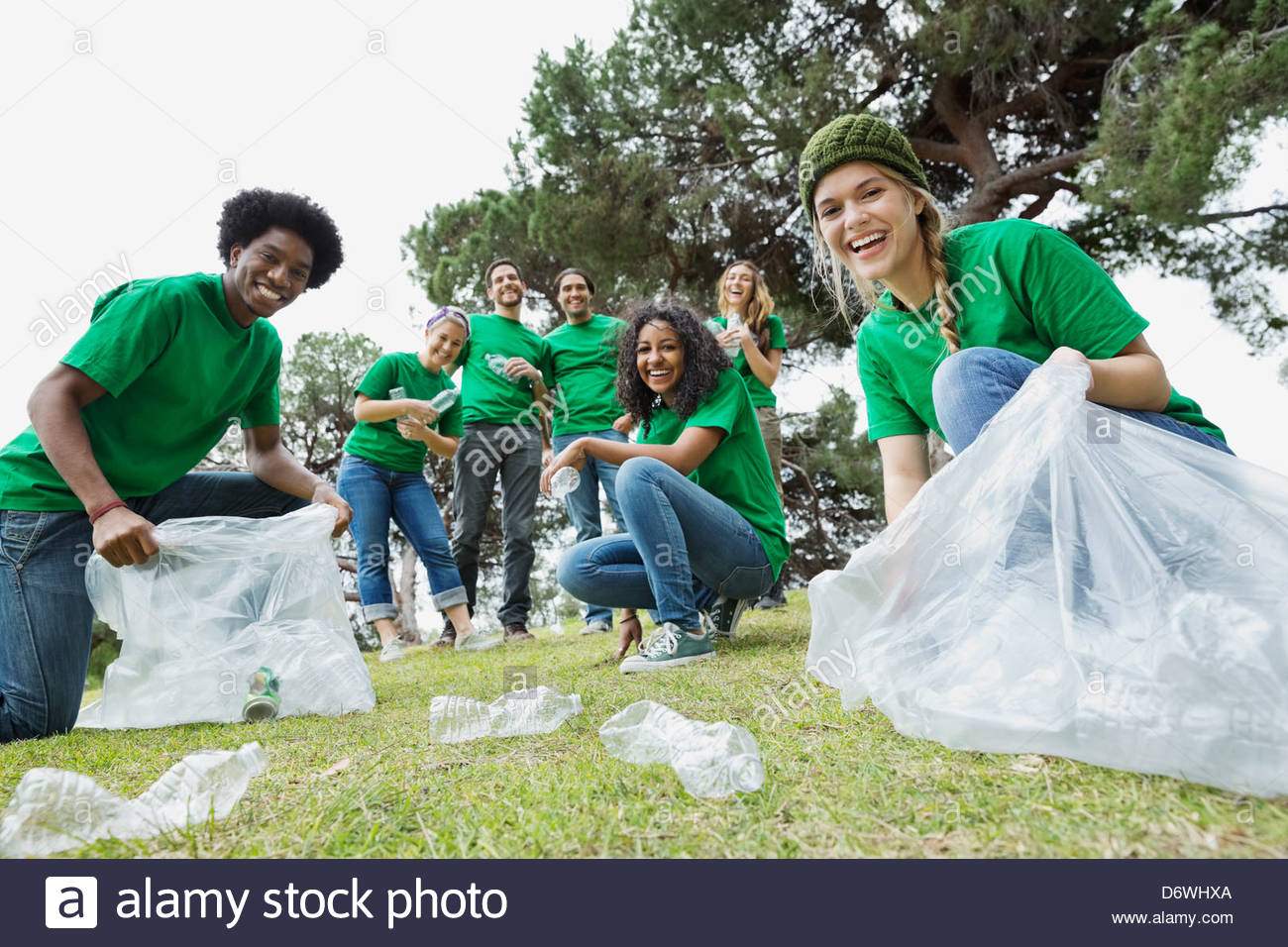 People collecting plastic bottles recycling hi-res stock photography ...