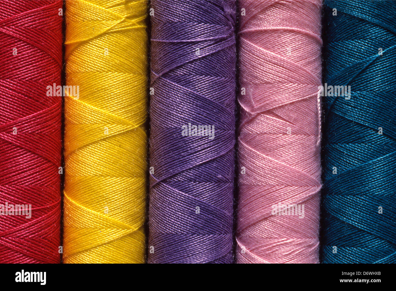 Spools of colored thread Stock Photo - Alamy