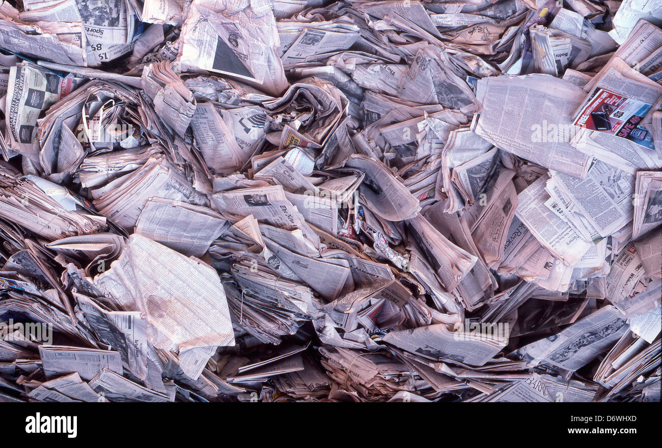 Newspapers in a recycling center Stock Photo - Alamy