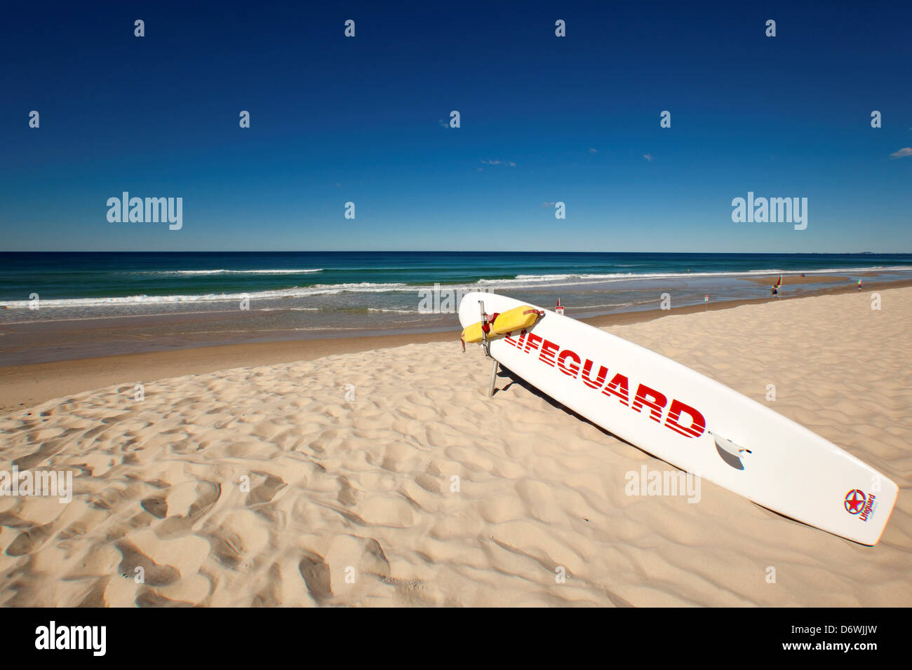 Australia, Gold Coast, Surfers Paradise, Lifeguard rescue surfboard on ...