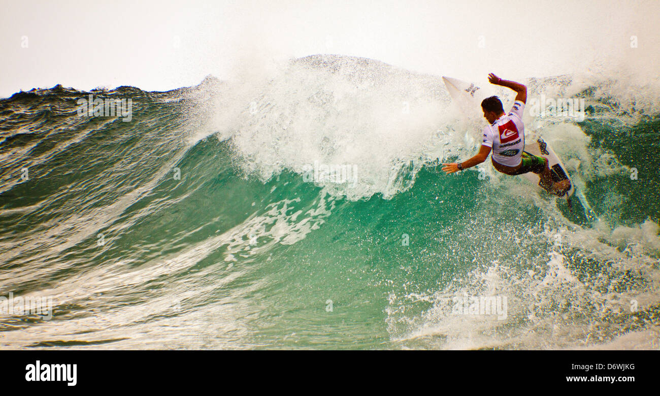 Surfer races at the Quiksilver and Roxy Pro World Title Event, Snapper ...