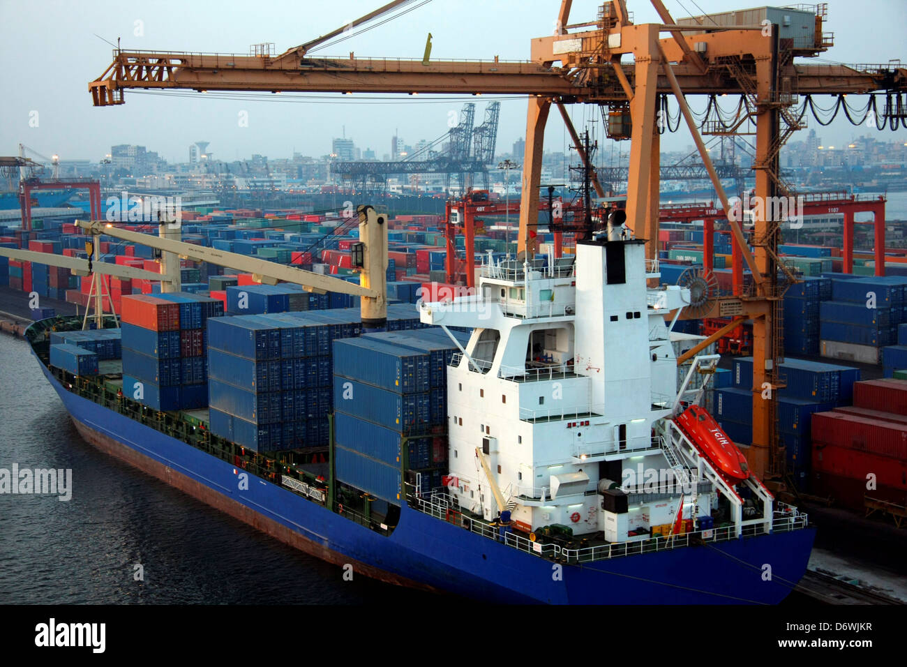 Cargo ship loading containers, Australia Stock Photo - Alamy