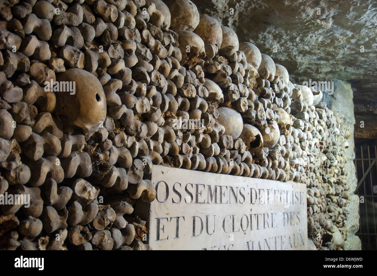 Human skulls lining the walls of the ancient Catacombs in Paris, Ile-de ...