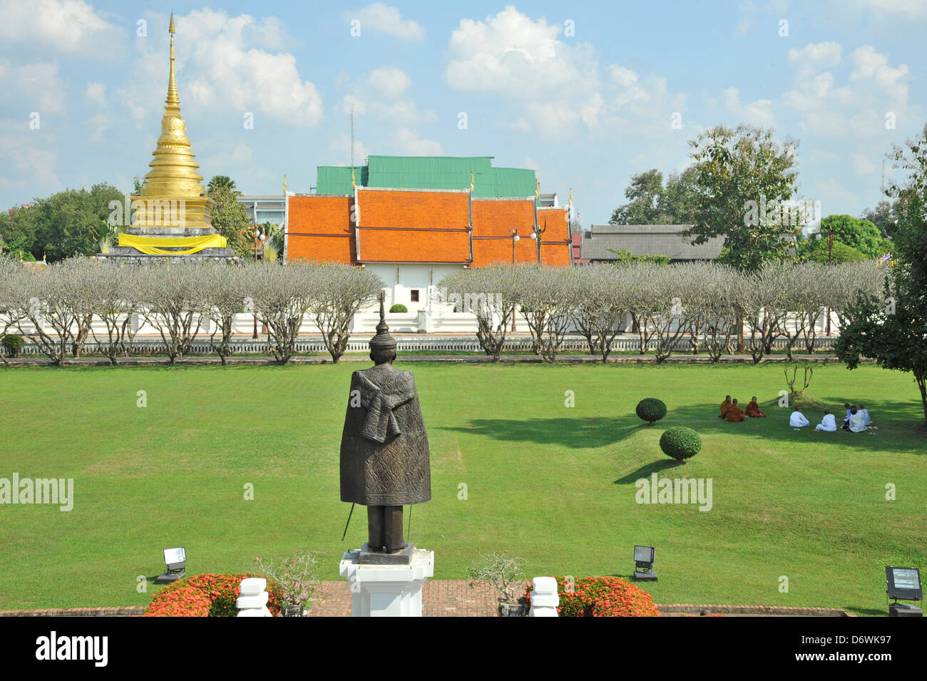 Thailand, Nan, Wat Chang Kham as seen from Nan National Museum. Statue ...