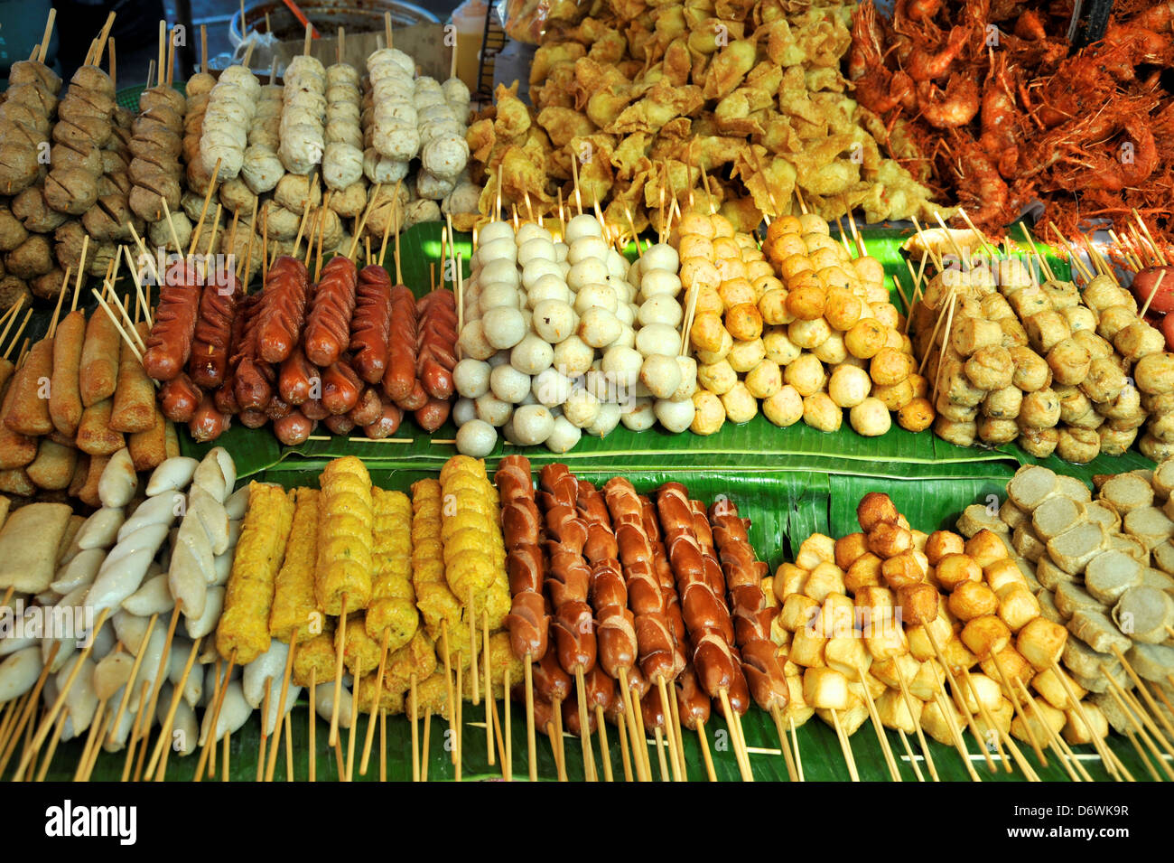Thailand, Khon kaen, Thai Pork satays, sausage snacks with sweet sauce ...