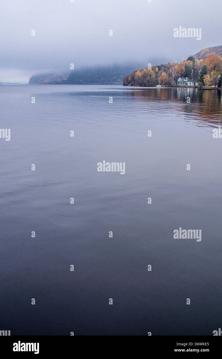 On a dark October morning, low clouds hang over the St-Maurice river ...