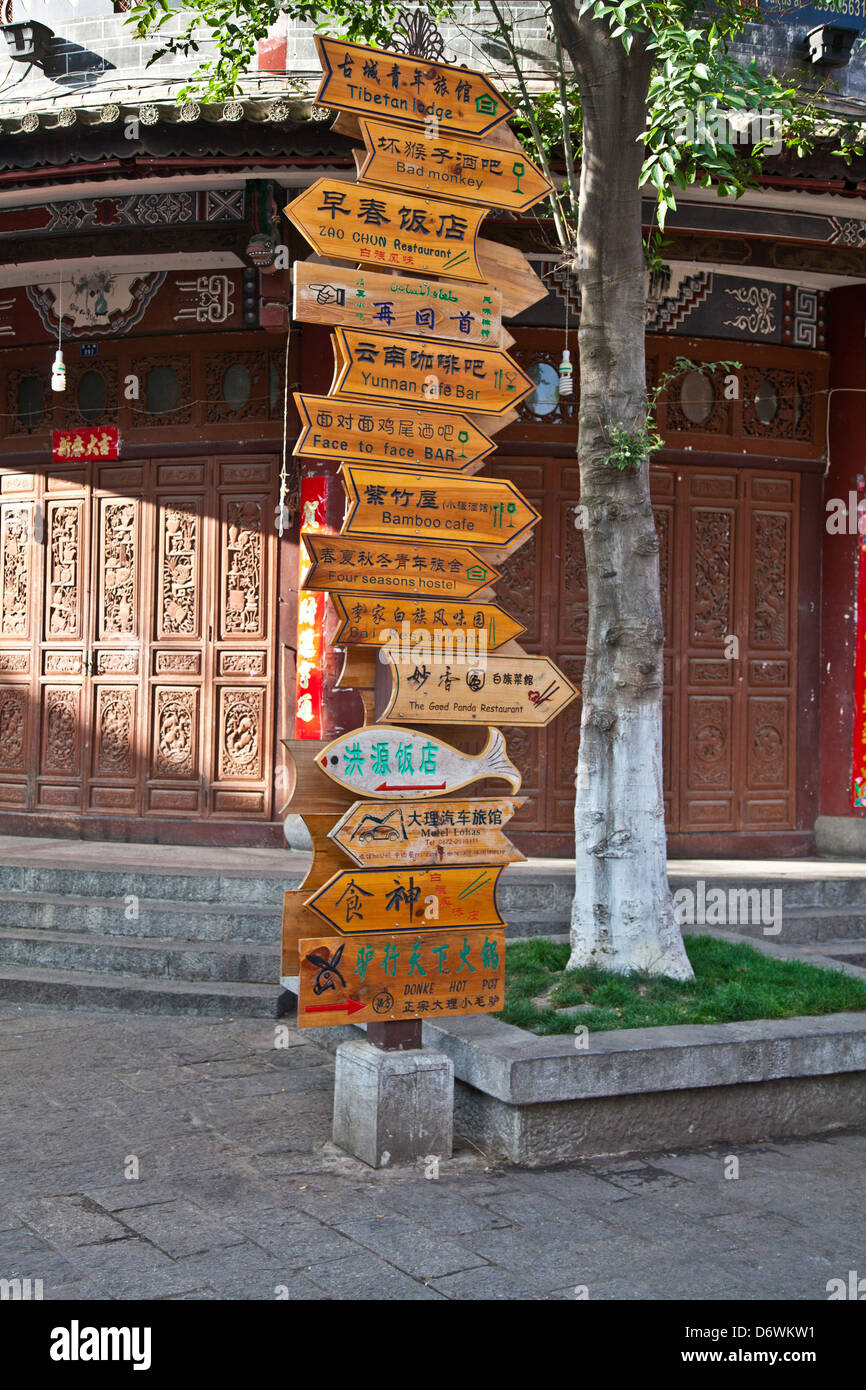 China, pole with information signs Stock Photo - Alamy