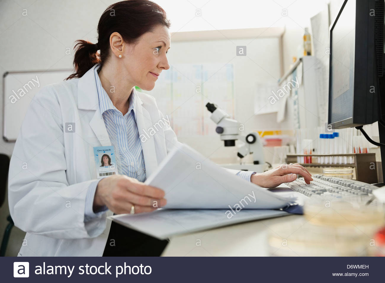 Female using desktop computer hi-res stock photography and images - Alamy