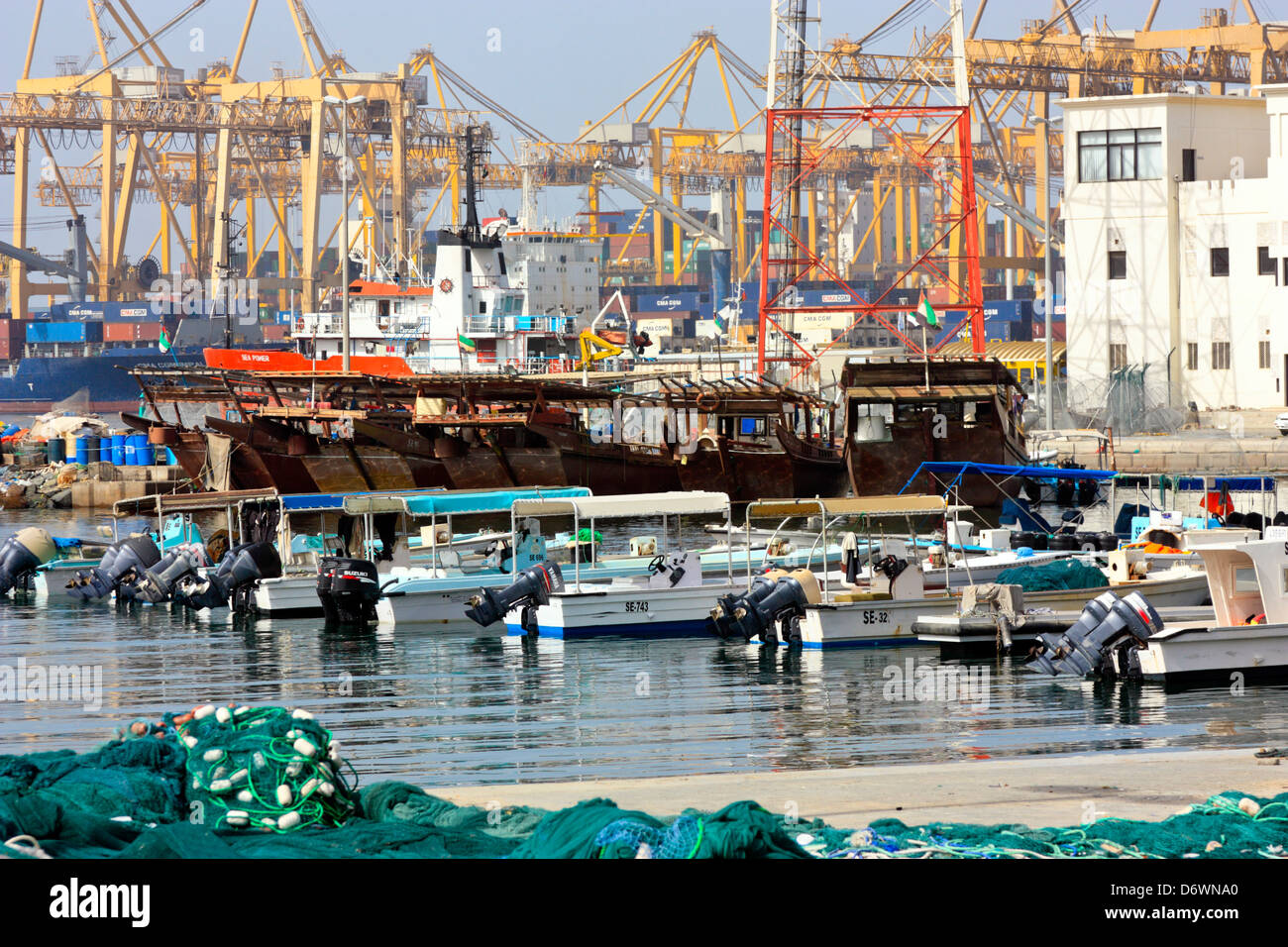 Container Bridges and Fishing Boats in the Port of Khor Fakkan, United ...