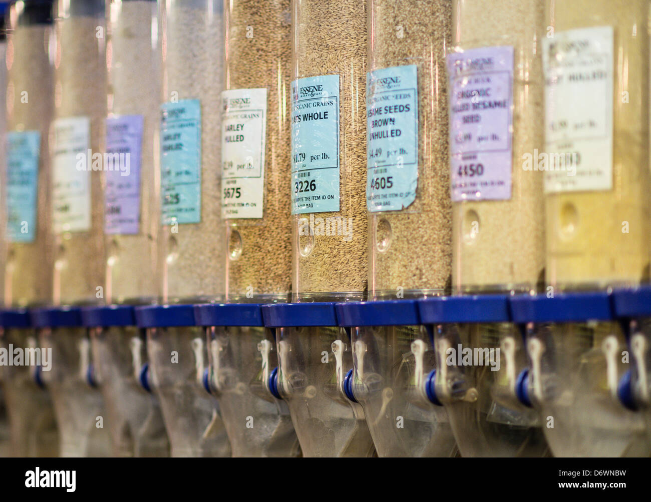 Whole organic grains in a store dispenser Stock Photo - Alamy