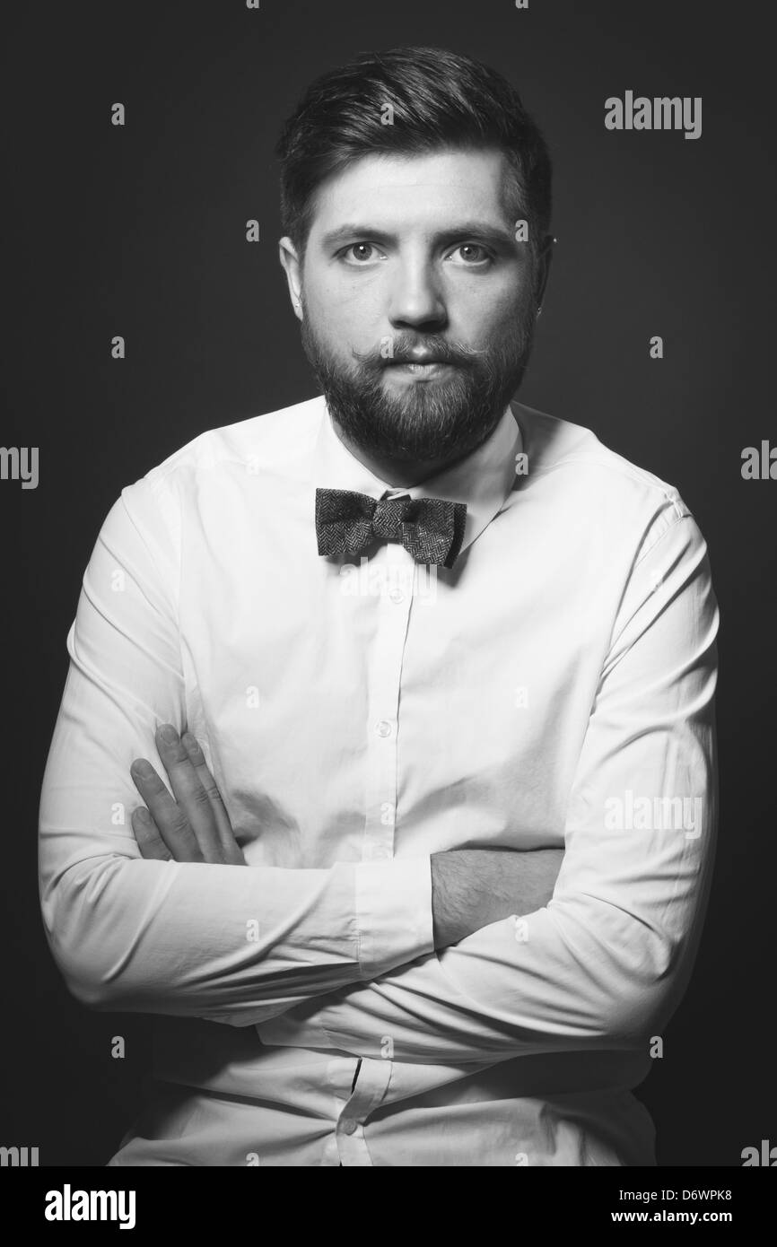Studio portrait of young man with great beard Stock Photo - Alamy