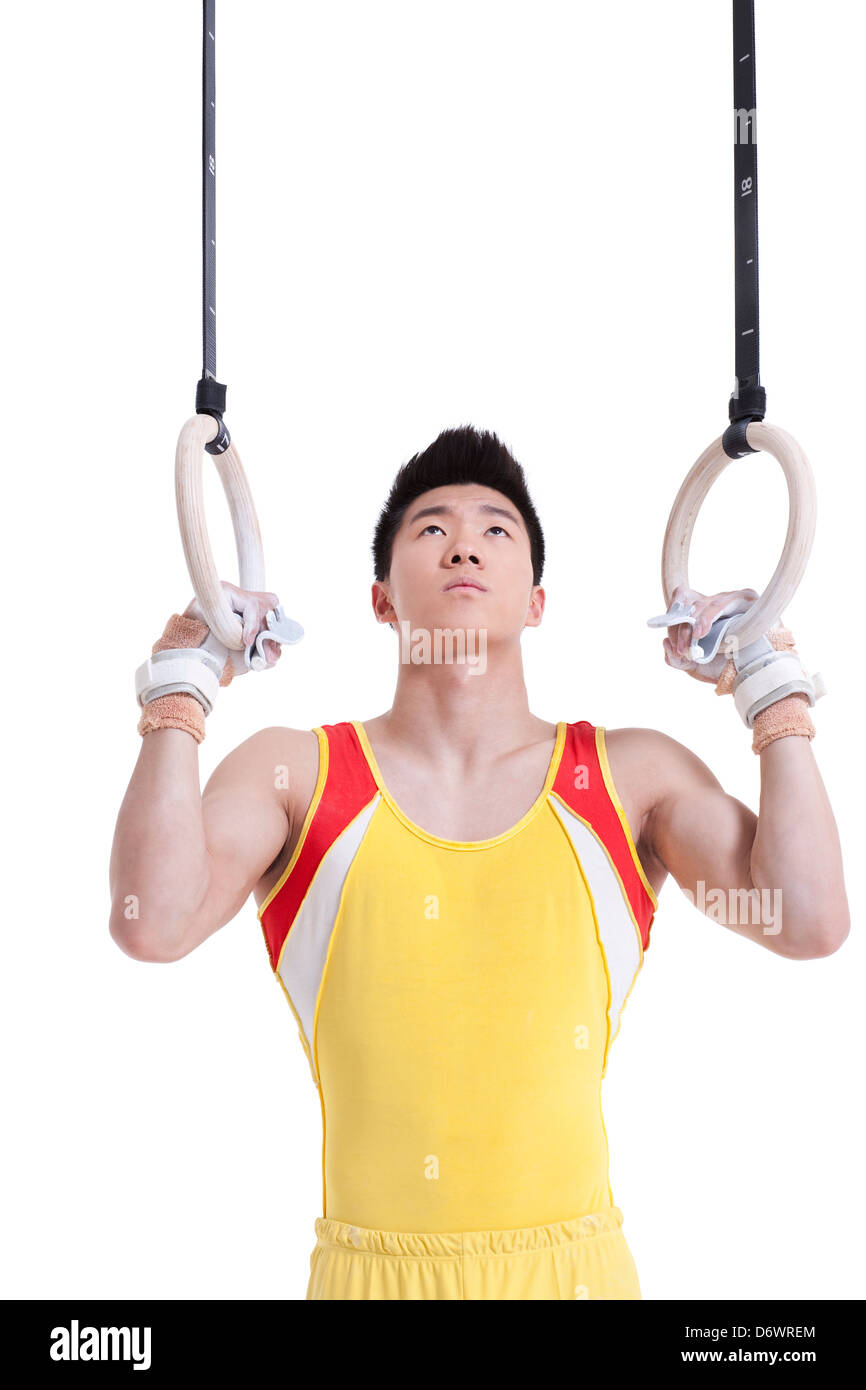 Gymnastic athlete and rings Stock Photo - Alamy