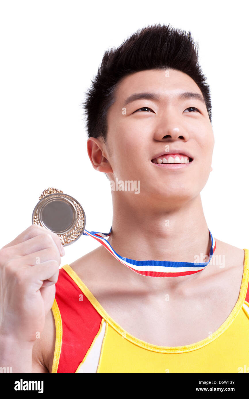 Athlete showing medal Stock Photo - Alamy