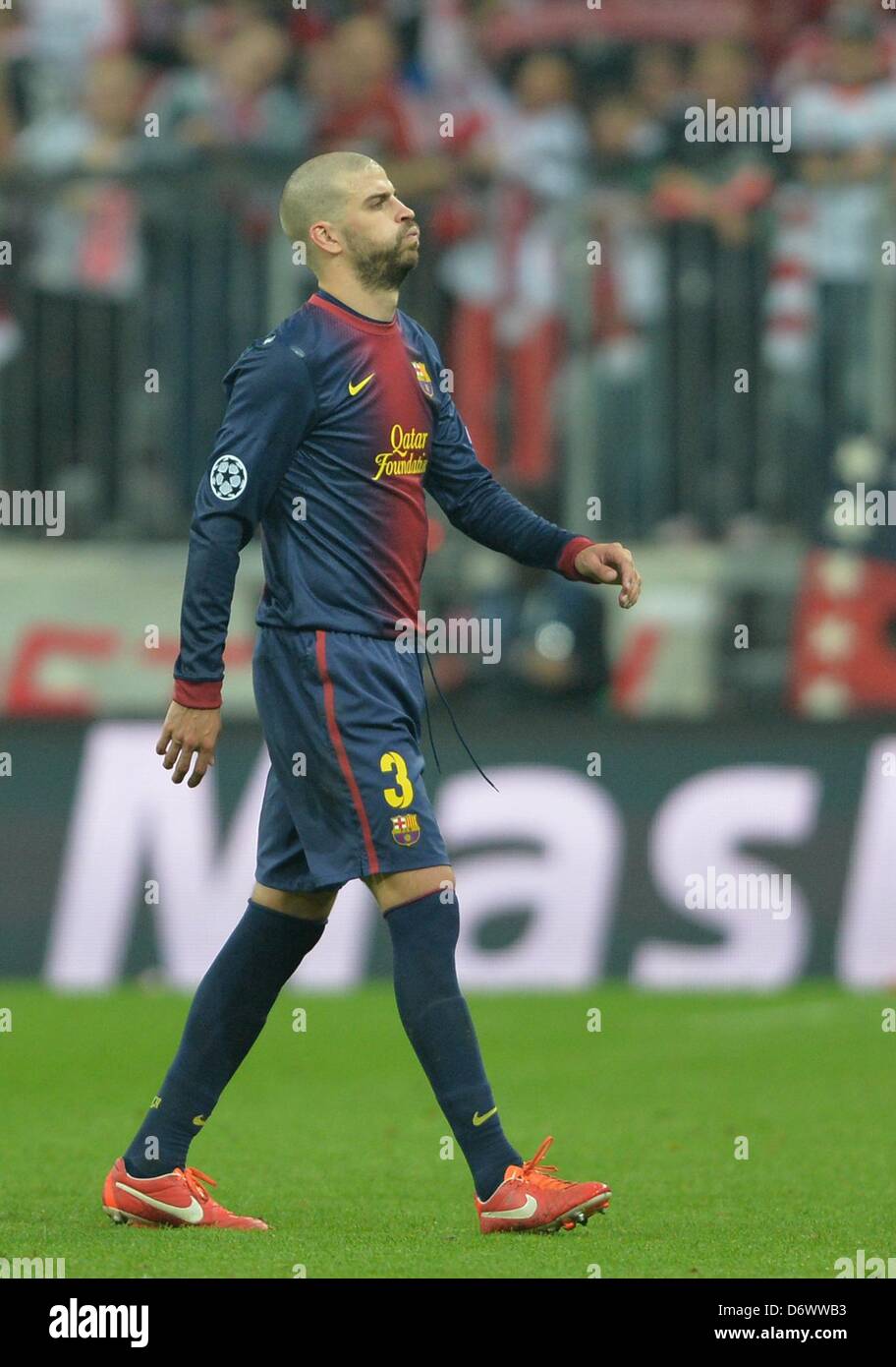 Barcelona's Gerard Piquet leaves the pitch after the UEFA Champions ...