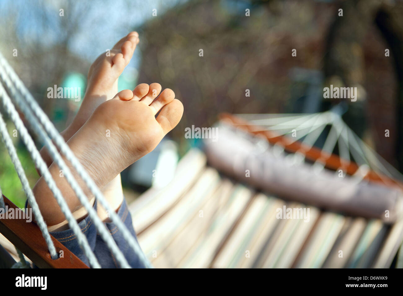 Relax in nature. Feet close up in a hammock Stock Photo - Alamy