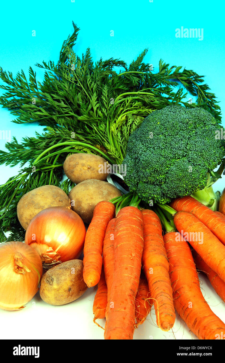 Selection of fresh vegetables including broccoli, carrot onion and ...