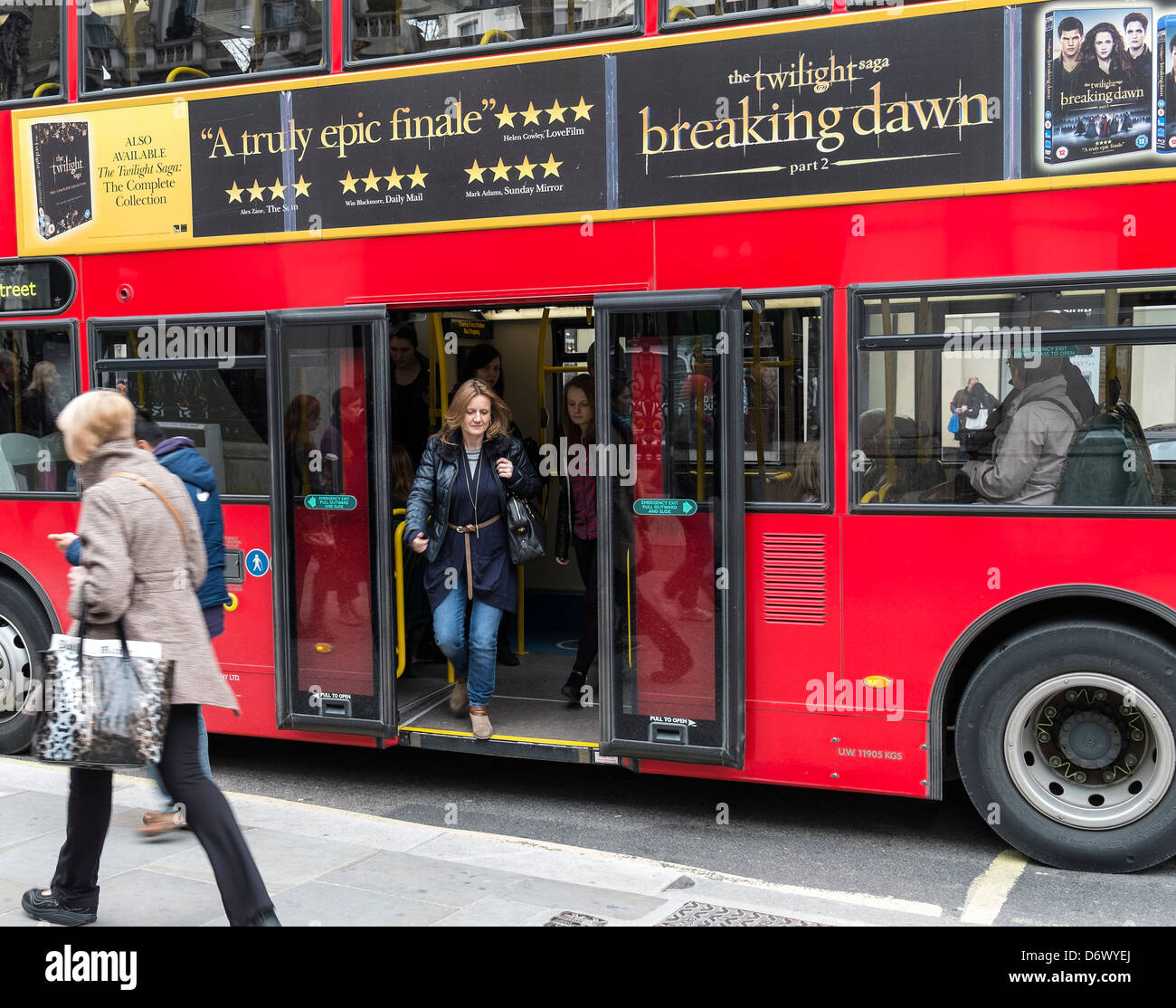 Passengers getting off a London bus Stock Photo - Alamy Passengers getting off a London bus Stock Photo - Alamy