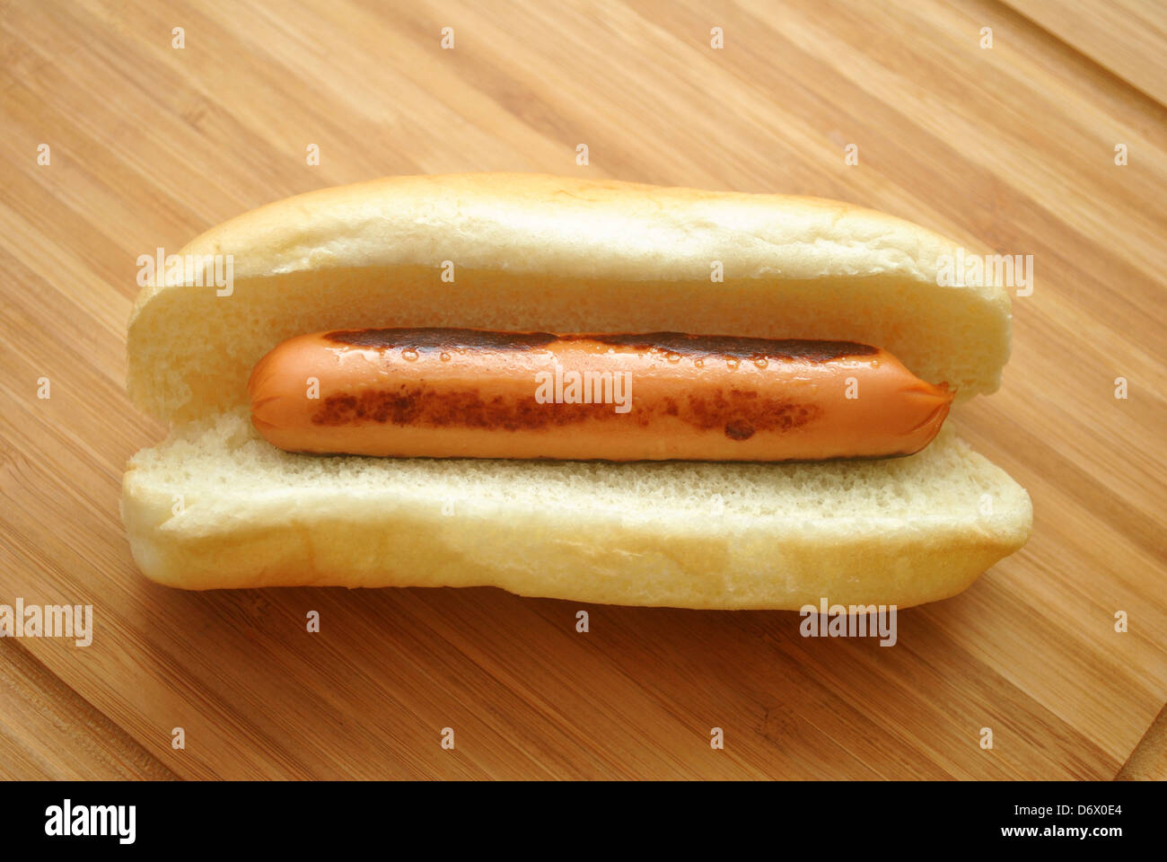 Browned Hotdog on a Bun Stock Photo - Alamy
