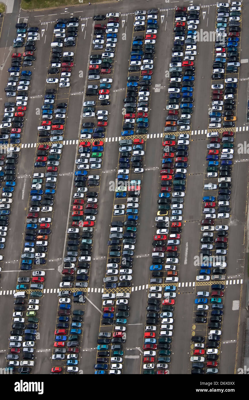 overhead ariel view of a large car park with cars at the Boots office ...