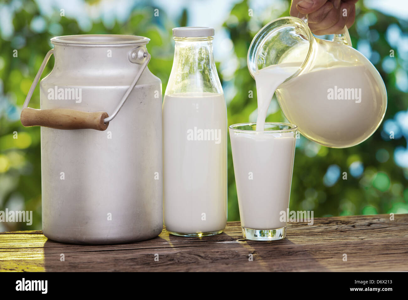 Pouring fresh milk in bottle hi-res stock photography and images - Alamy